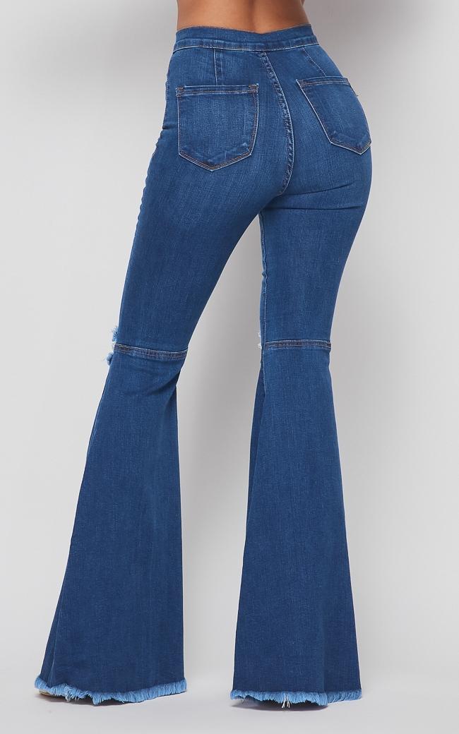 Vibrant Ripped Knee Super Flare Jeans (Plus Sizes Available) - Medium ...